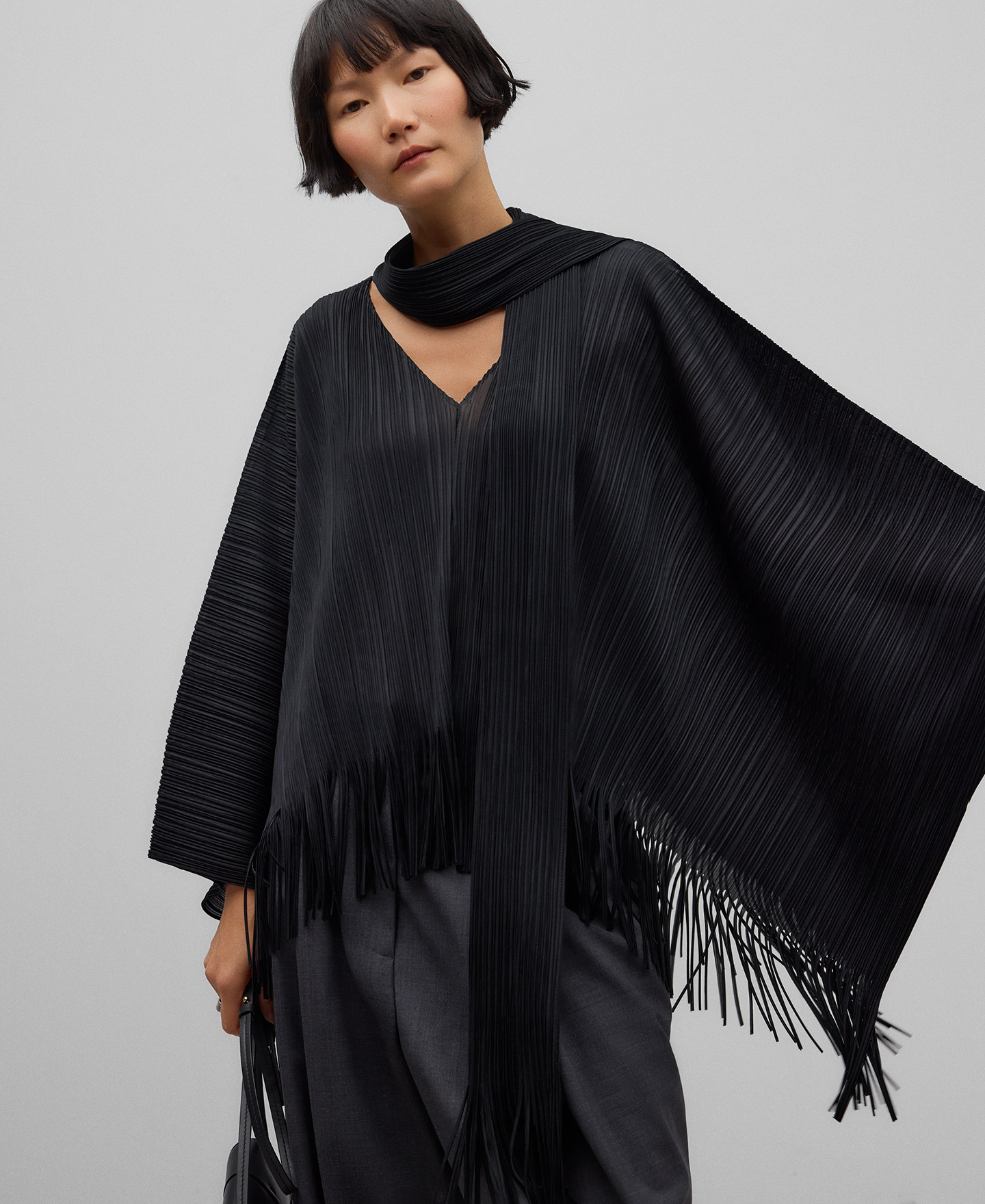 Pleated fabric poncho with fringes woman | AD USA